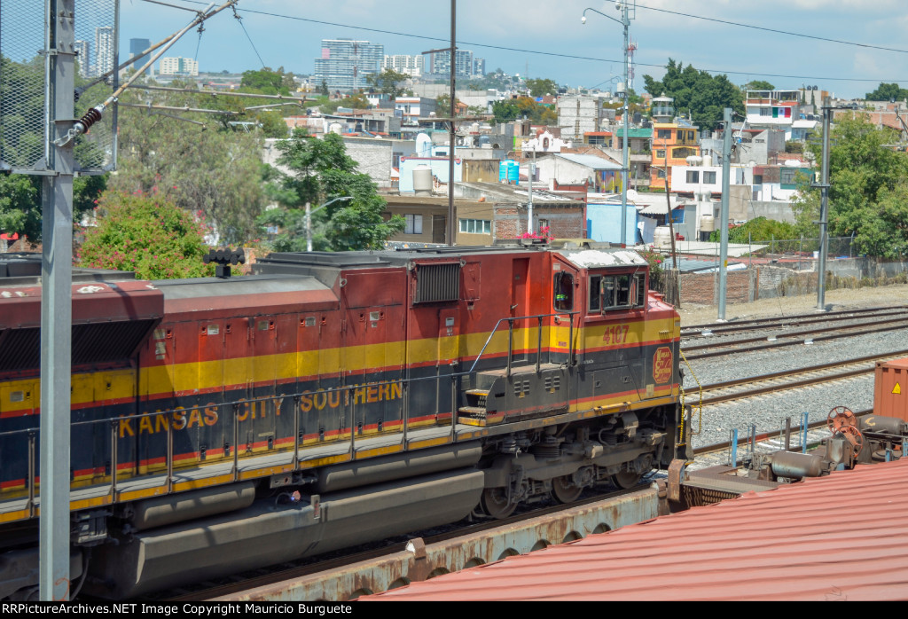 KCS SD70ACe leading a train